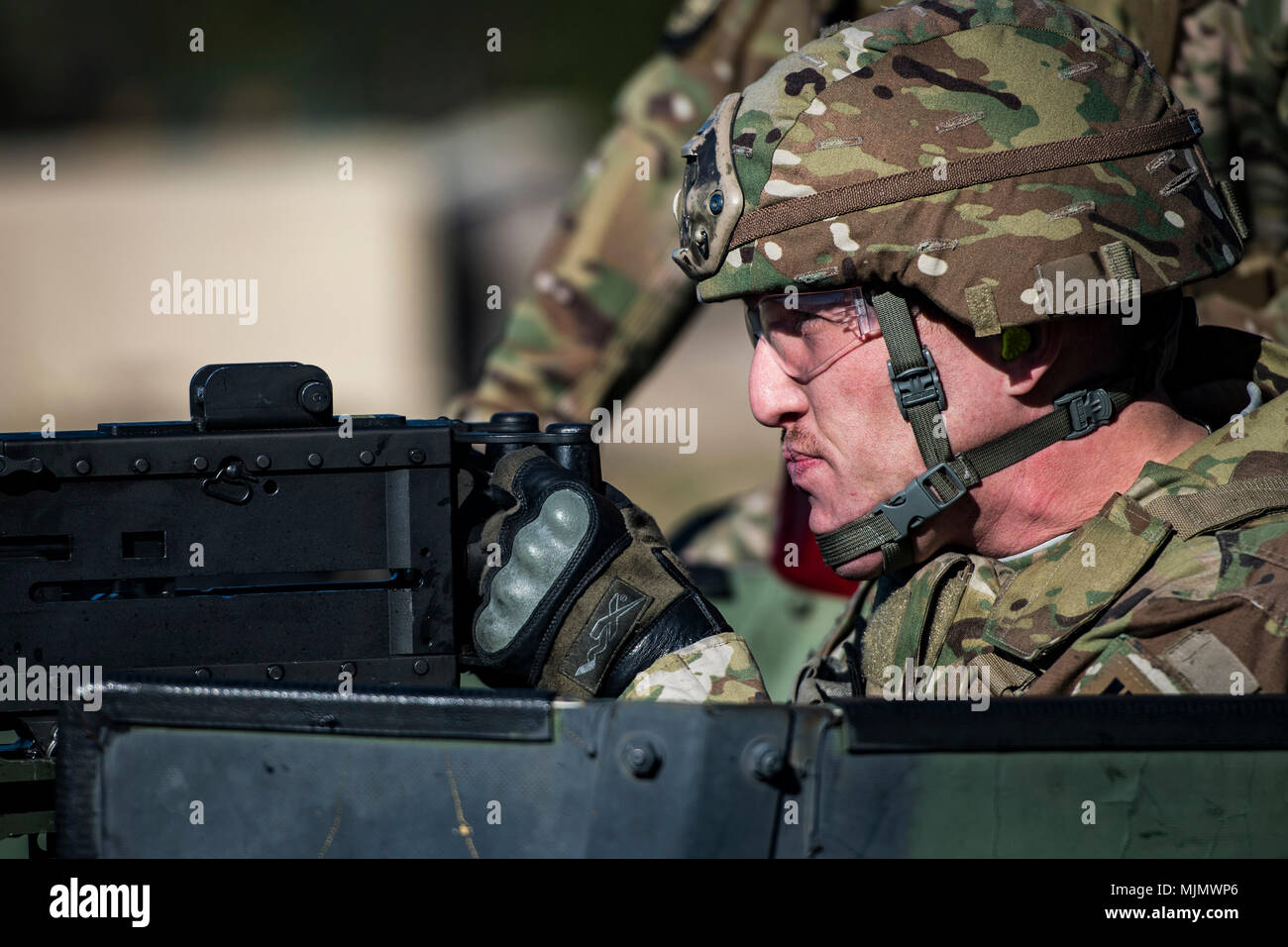 Tech. Sgt. Brian Bond, 823d Base Defense Squadron fireteam member, aims ...