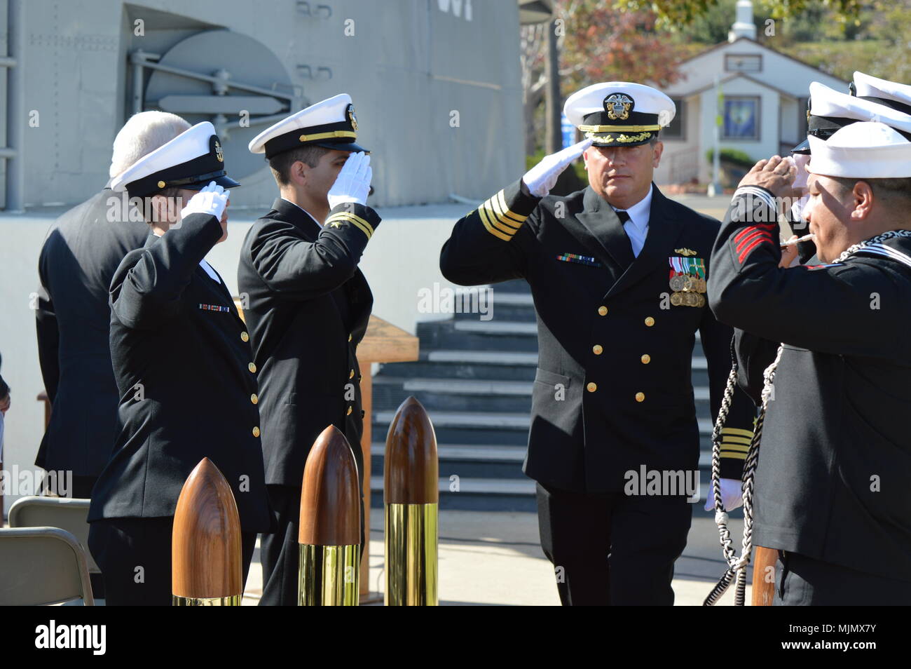 Capt. Jeff Butcher is piped ashore after taking command of Navy Reserve ...