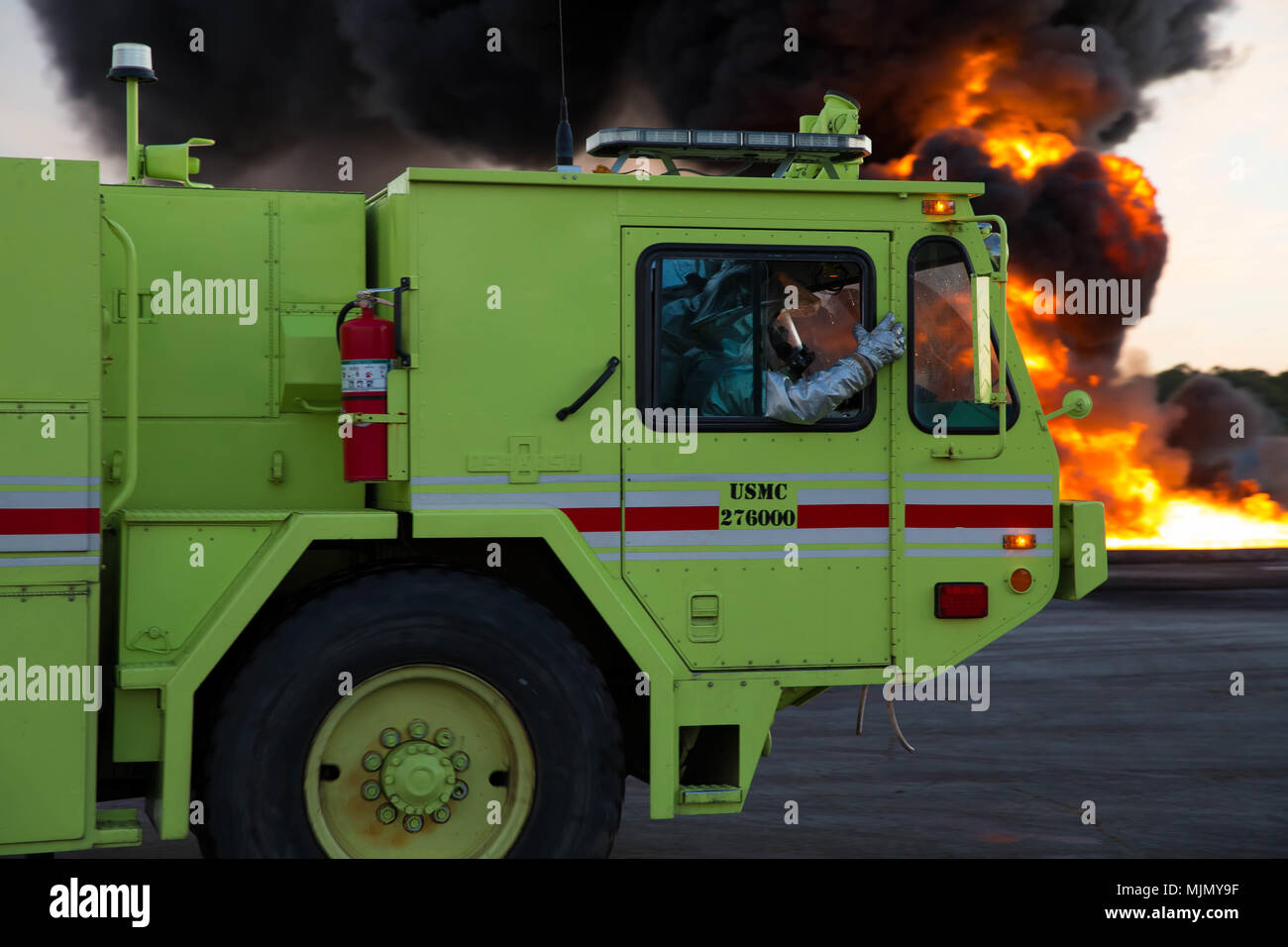 U.S. Marines with Aircraft Rescue and Firefighting (ARFF), respond to a ...