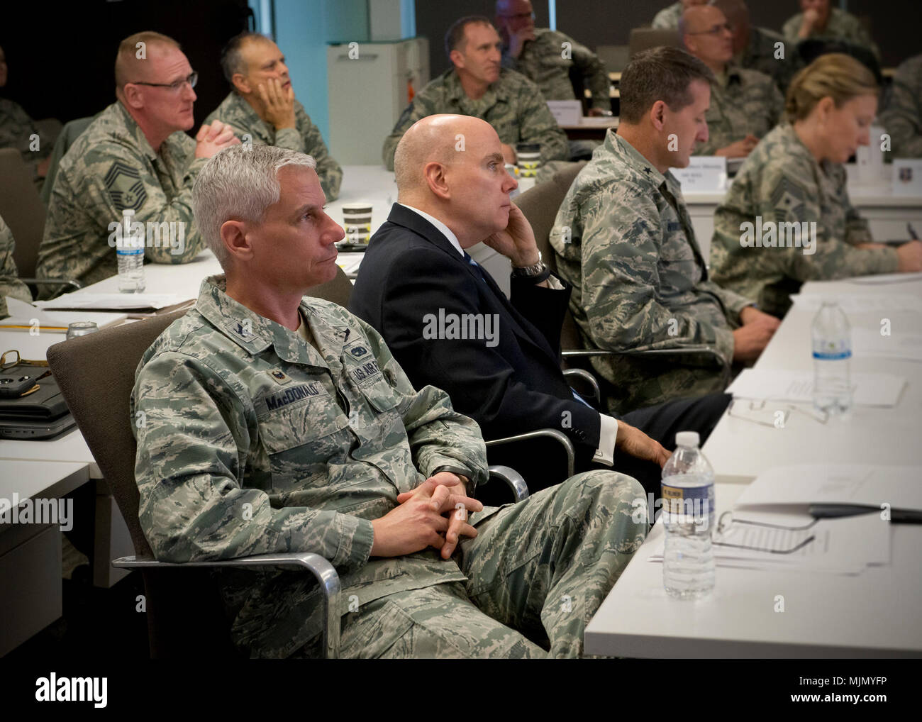 (Left to right) Col. Keith MacDonald, vice commander of the Air ...