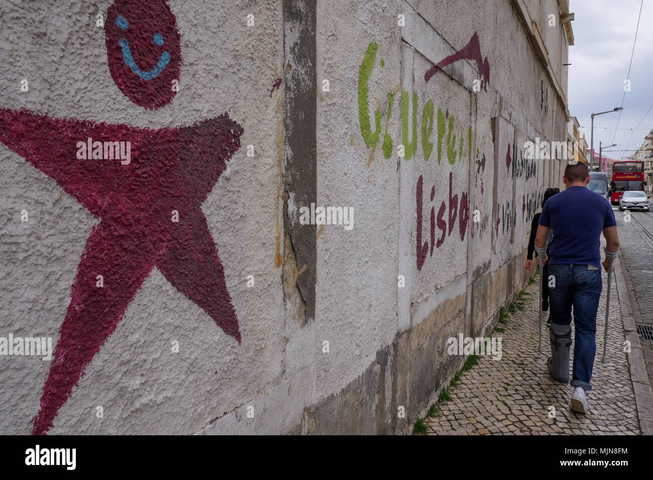 Street view with colored grffiris, Belem district, Lisbon, Portugal ...