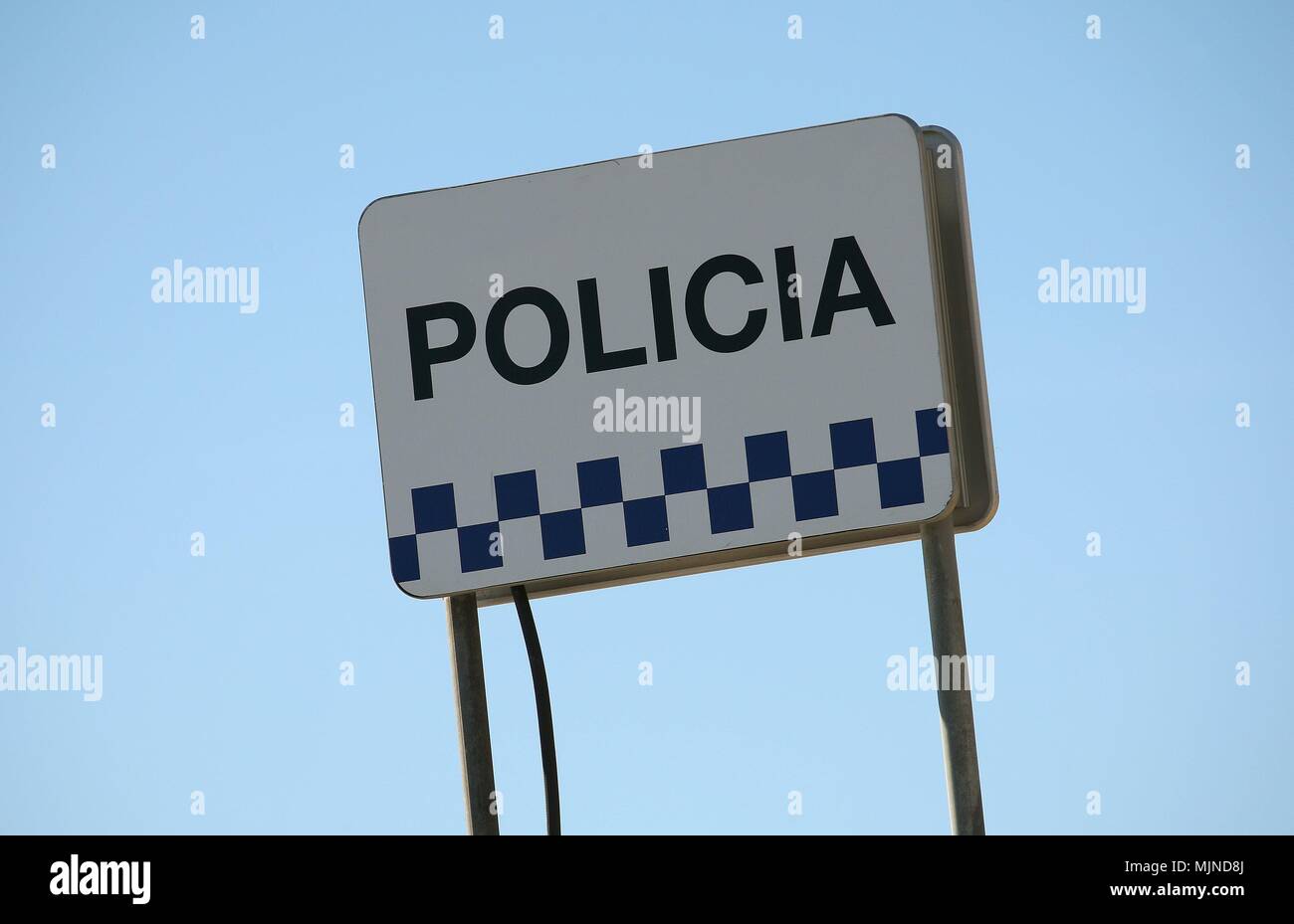 Police Station sign on the beach in the seaside city of Calella on the ...