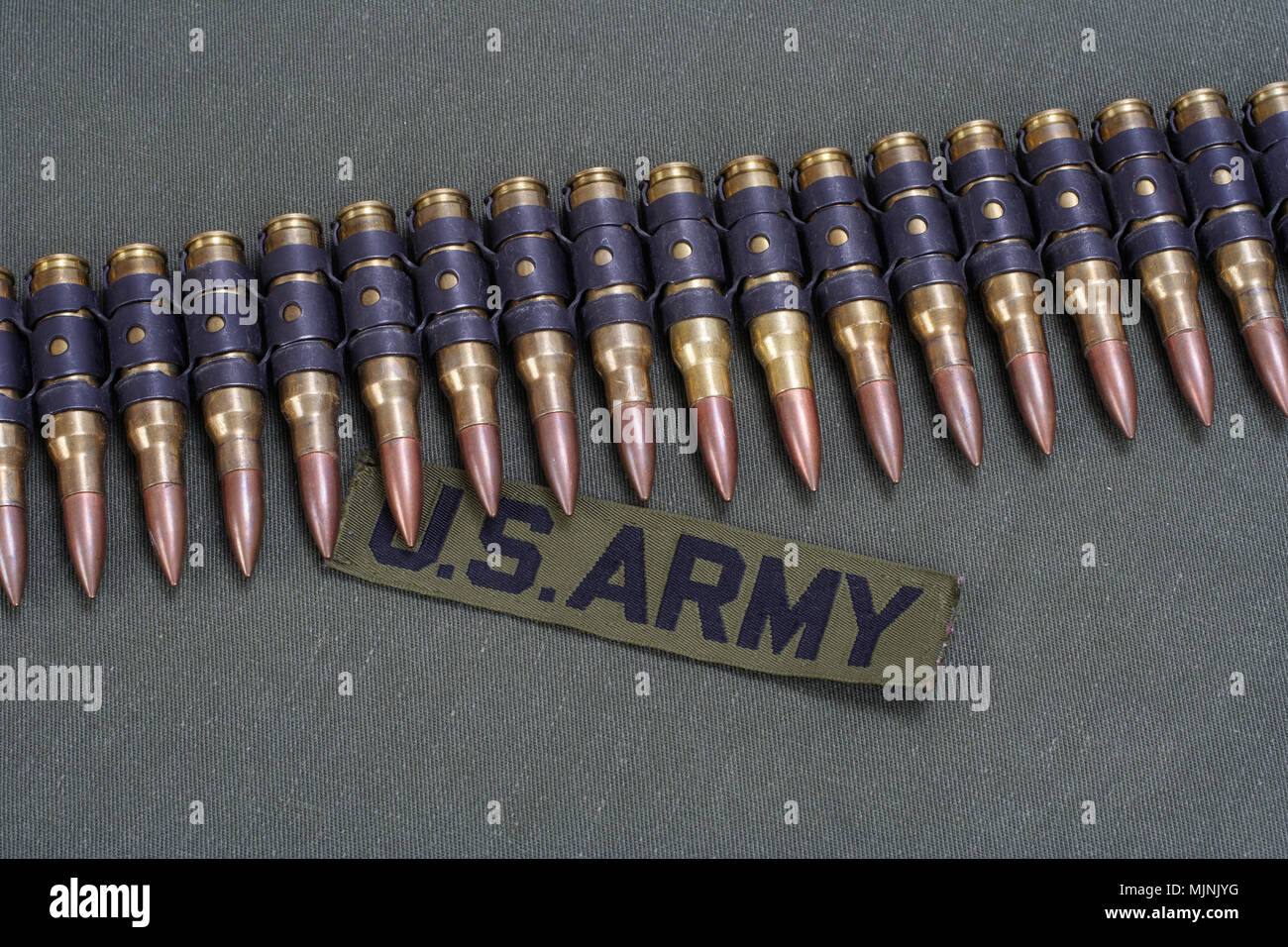 ammunition belt on US ARMY uniform background Stock Photo - Alamy