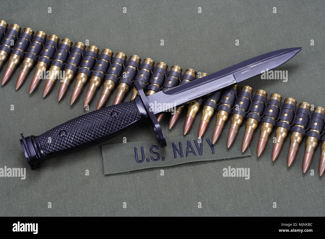 bayonet and ammunition belt on US NAVY uniform background Stock Photo ...