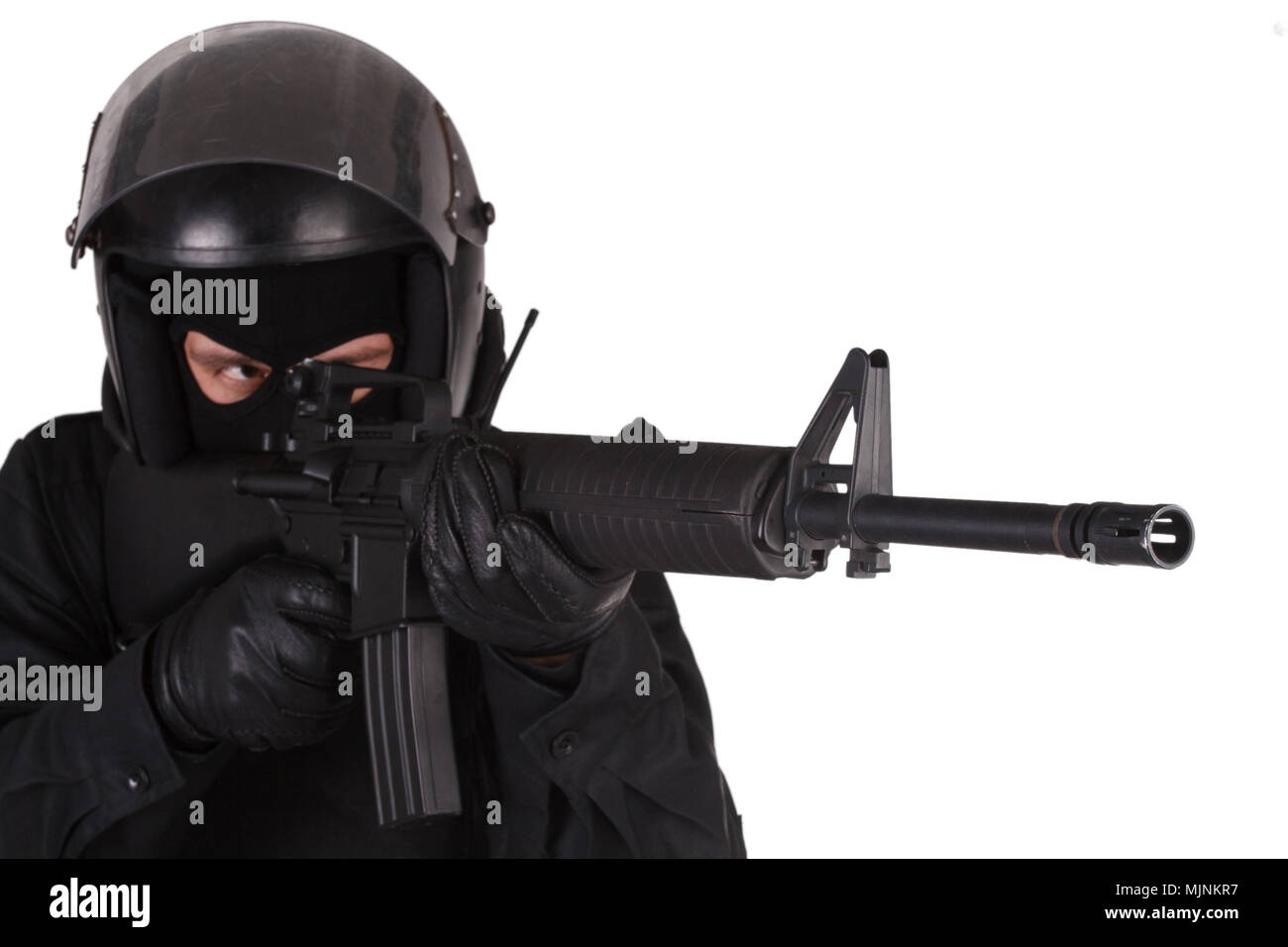 Riot police officer with weapon in black uniform isolated on white ...
