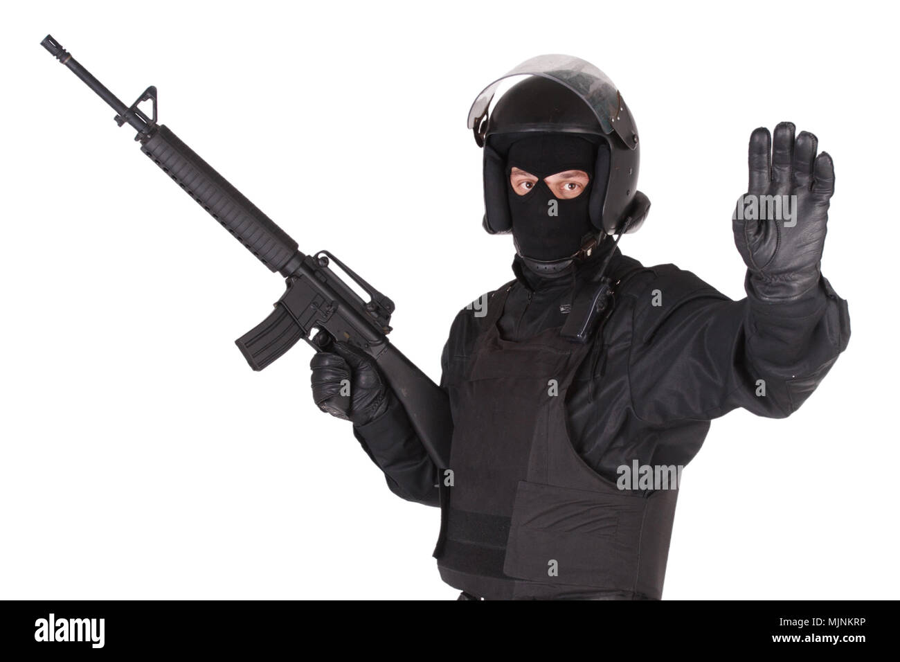 Riot police officer with weapon in black uniform isolated on white ...