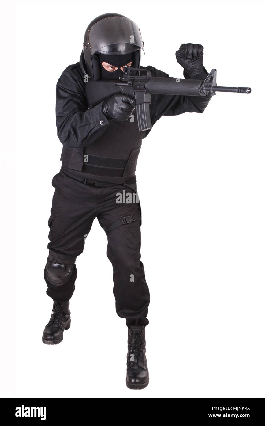 Riot police officer with weapon in black uniform isolated on white ...