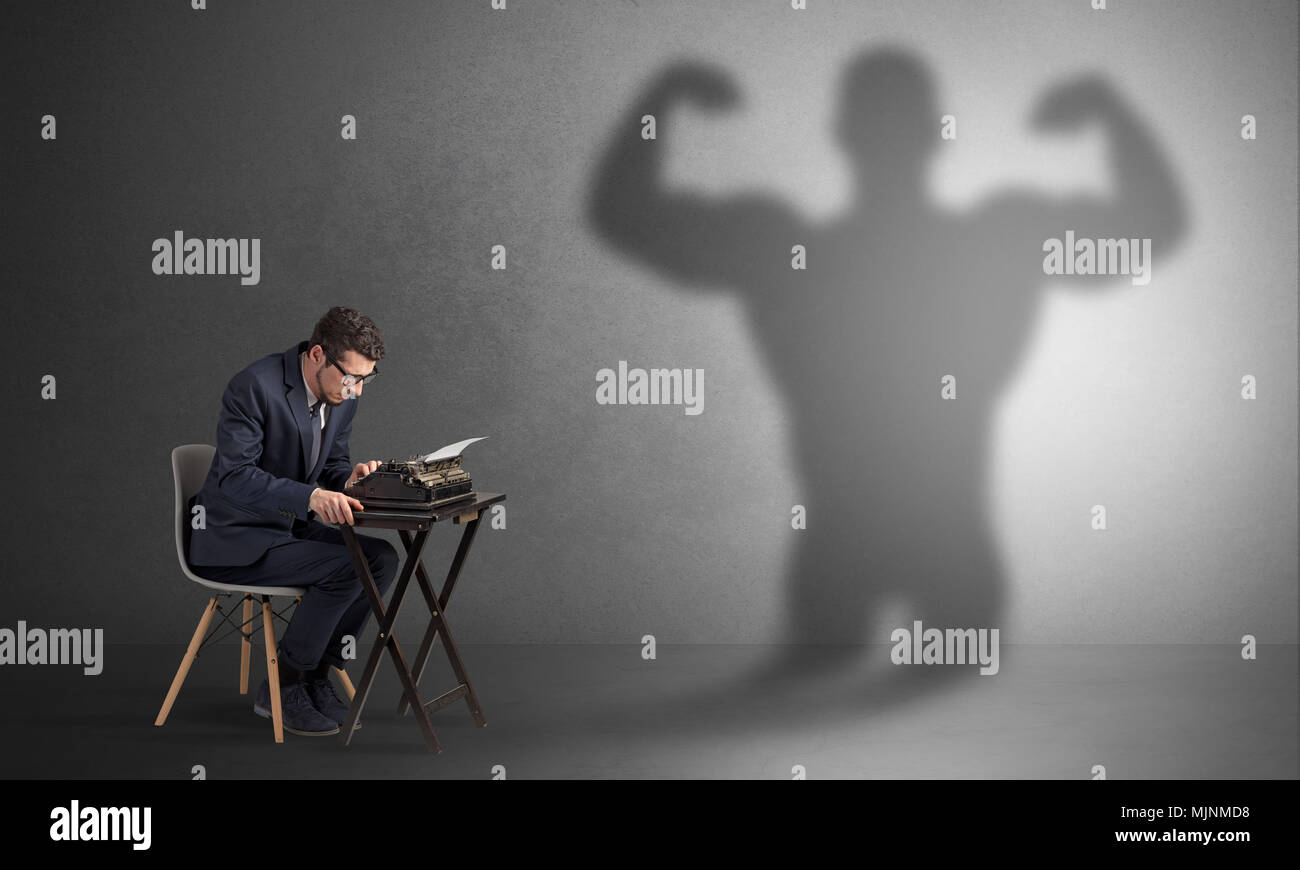 Little hard worker afraid of scary monster shadow Stock Photo - Alamy