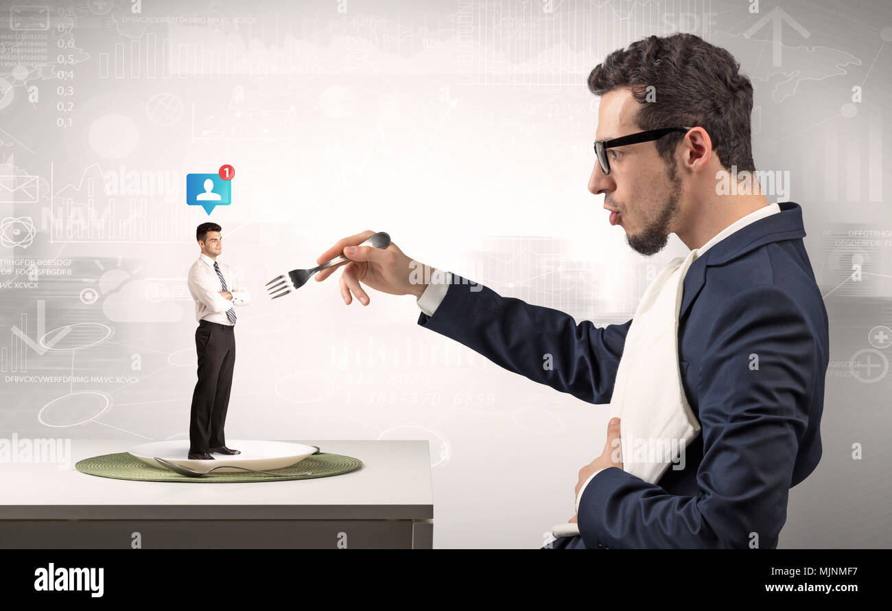 Giant businessman eating small man with financial background Stock ...