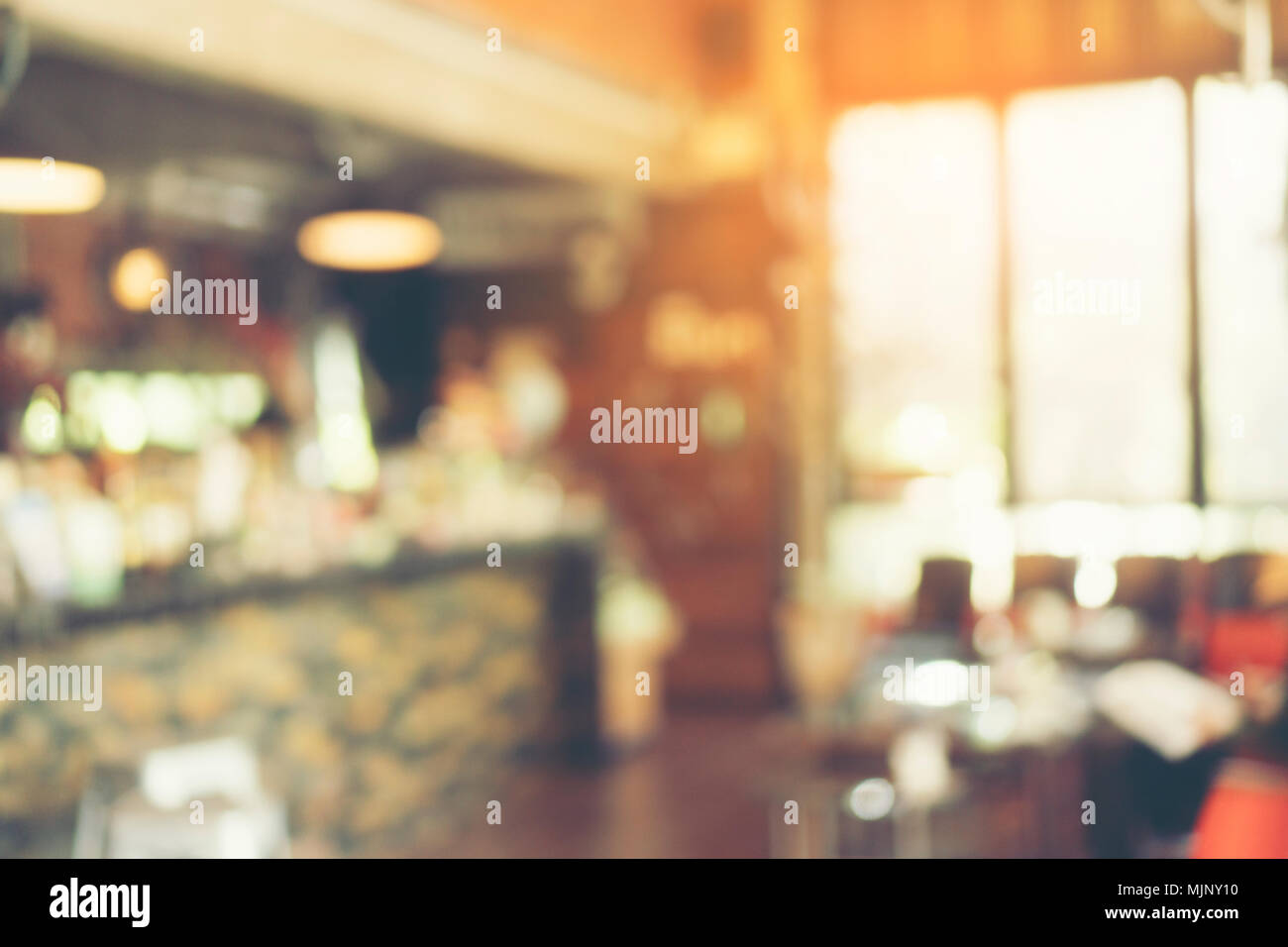 blurry background of coffee cafe with vintage light tone Stock Photo ...