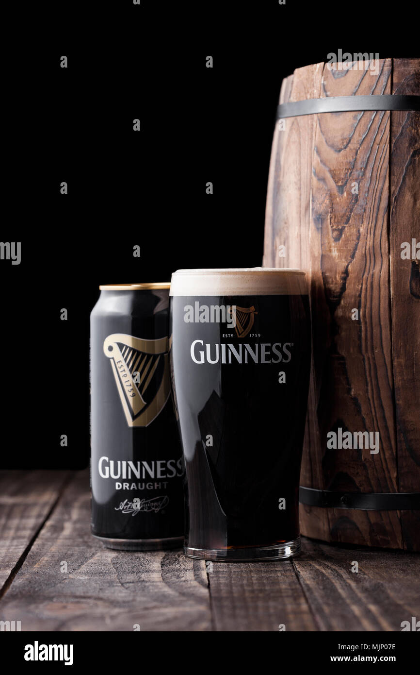LONDON, UK - MAY 03, 2018: Aluminium can and original glass of Guinness ...