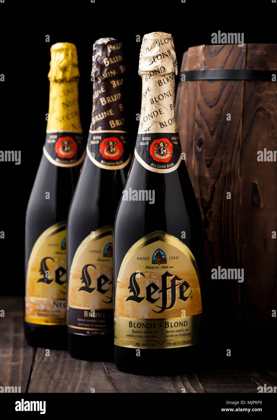 LONDON, UK - MAY 03, 2018: Cold bottles of Leffe beer next to wooden ...