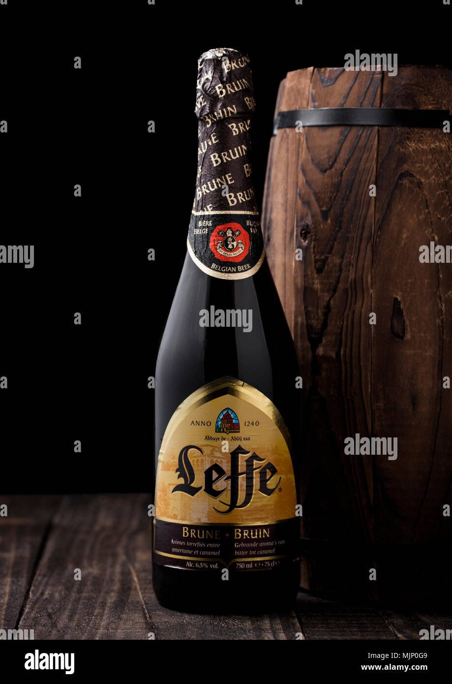 LONDON, UK - MAY 03, 2018: Cold bottle of Leffe beer next to wooden ...