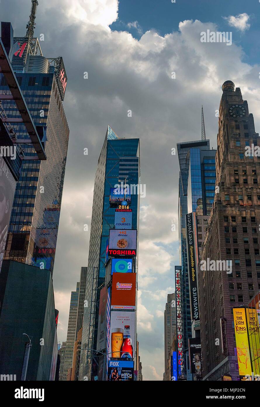 Tall buildings and bright lights around Time Square, New York Stock ...