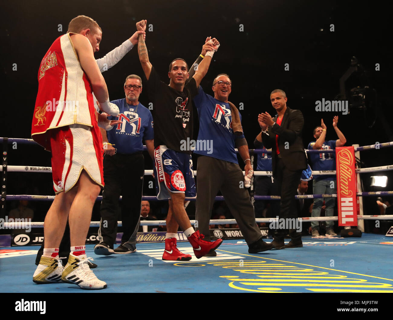 Emmanuel Rodriguez (centre) celebrates winning the IBF World ...