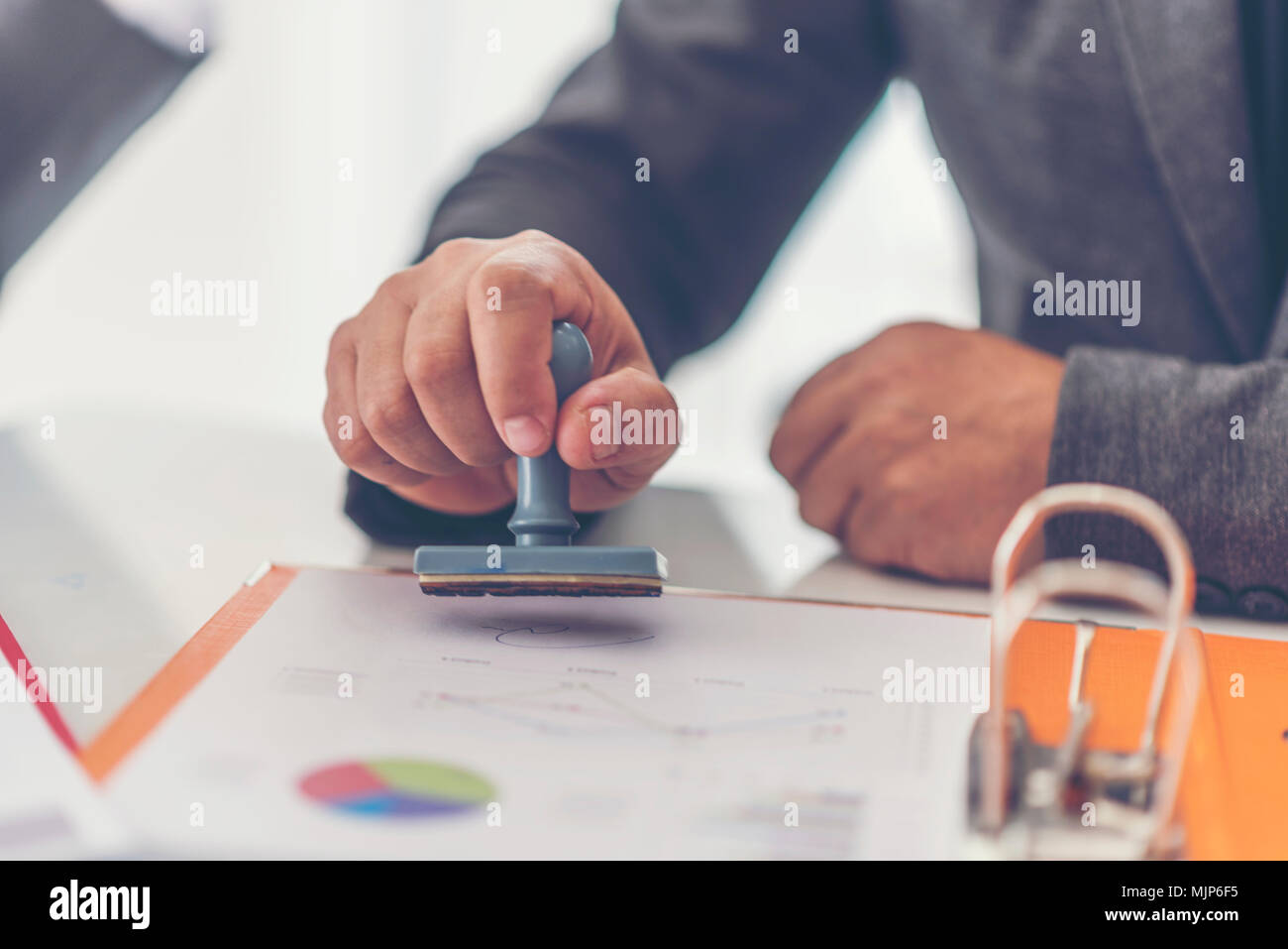 Business stamping rubber Stamp on a documents - business concept Stock ...