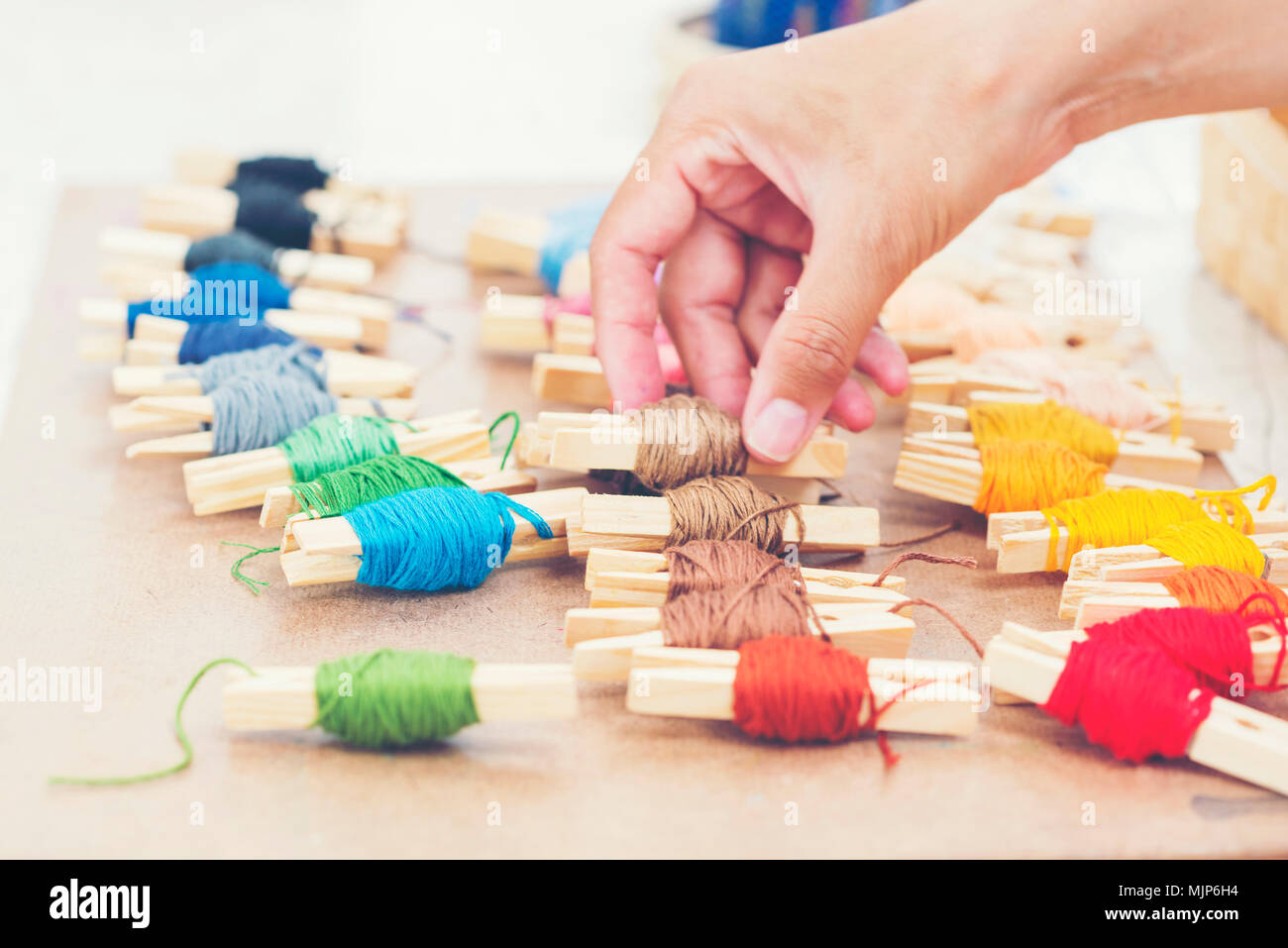 Colorful embroidery thread Stock Photo - Alamy