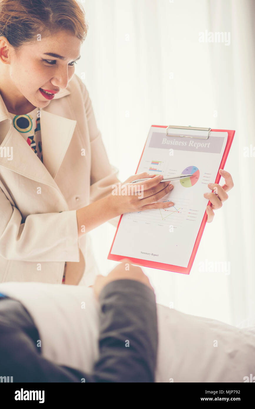 Sick Businessman are working on Hospital Bed with secretary women, Work ...