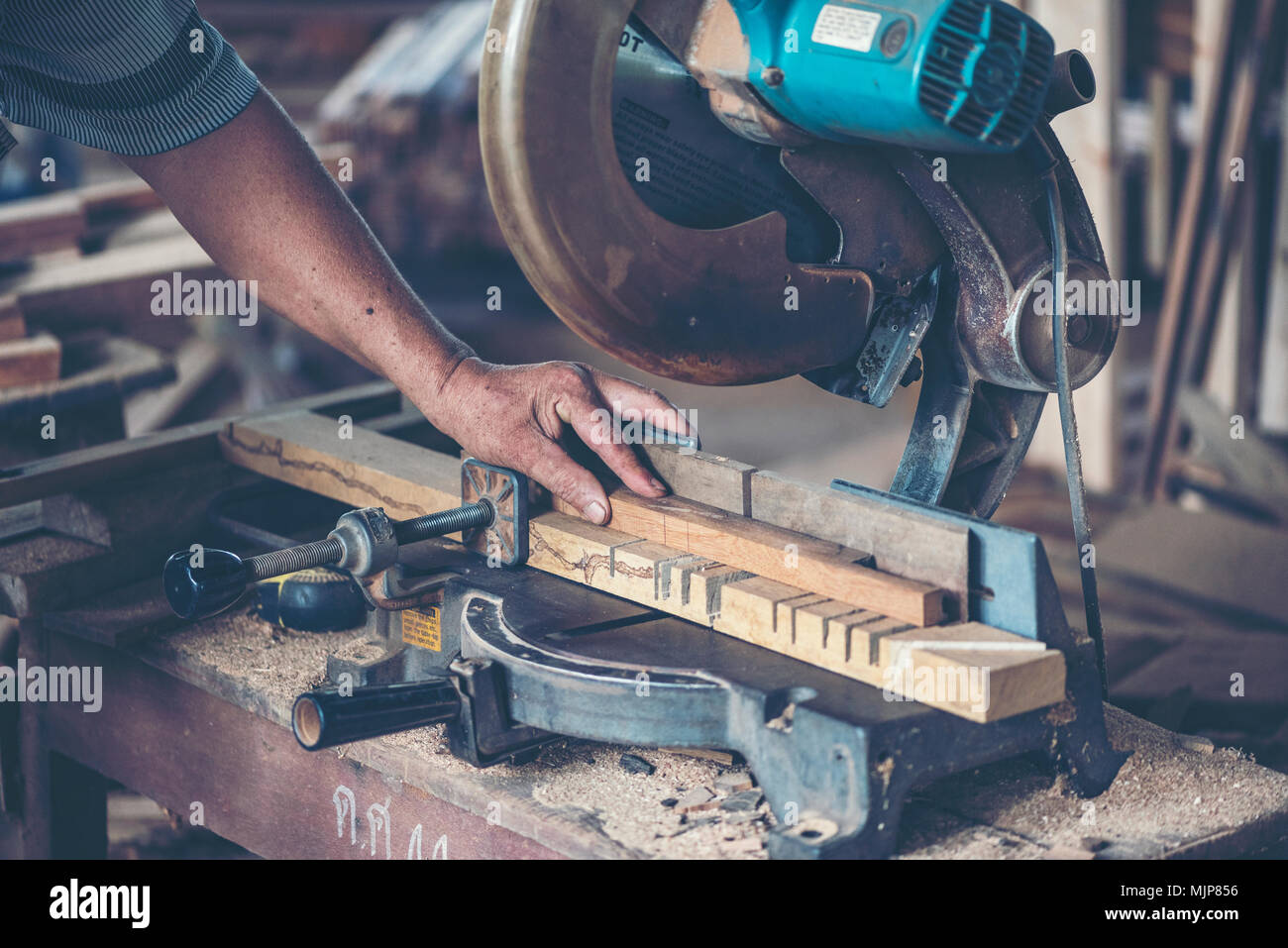Background image of woodworking workshop: carpenters work table with ...