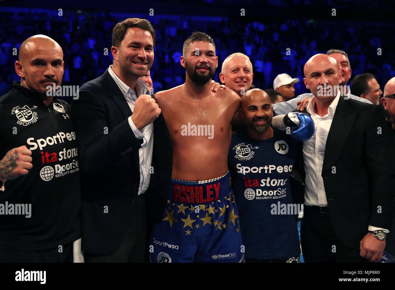 Eddie Hearn, Tony Bellew and trainer David Coldwell during the ...