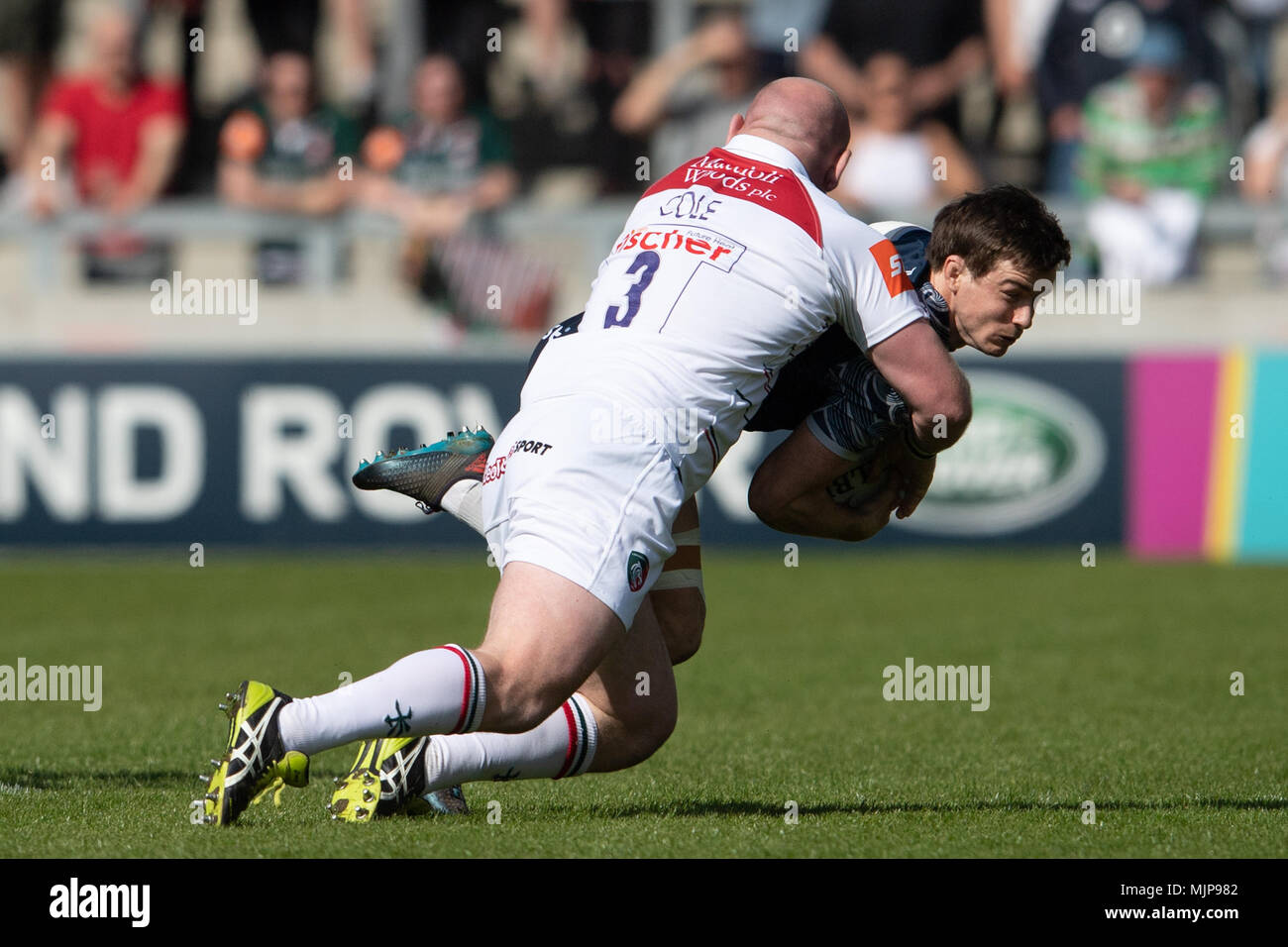 Sale Shark's AJ MACGINTY is tackled by Leicester Tigers's Dan Cole 5th ...