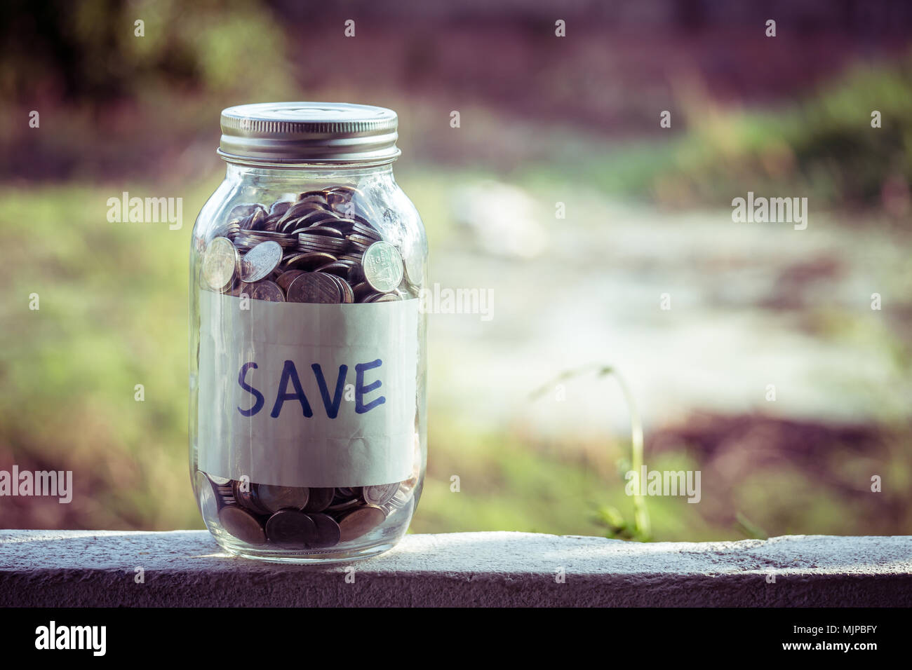 Money in glass filter hi-res stock photography and images - Alamy