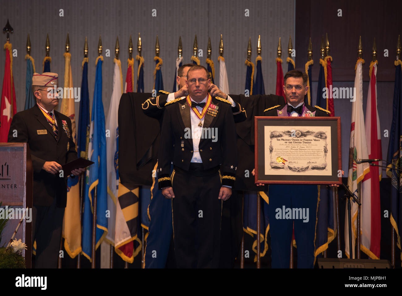 Maj. Gen. Arthur J. Logan receives an award during the Hawaii National ...