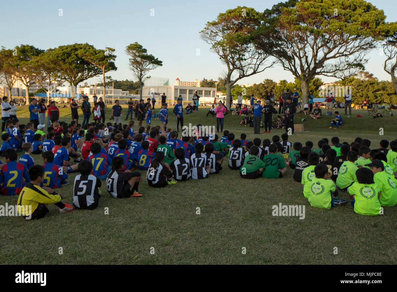 CAMP LESTER, OKINAWA, Japan— Teams and parents gather during an award ...