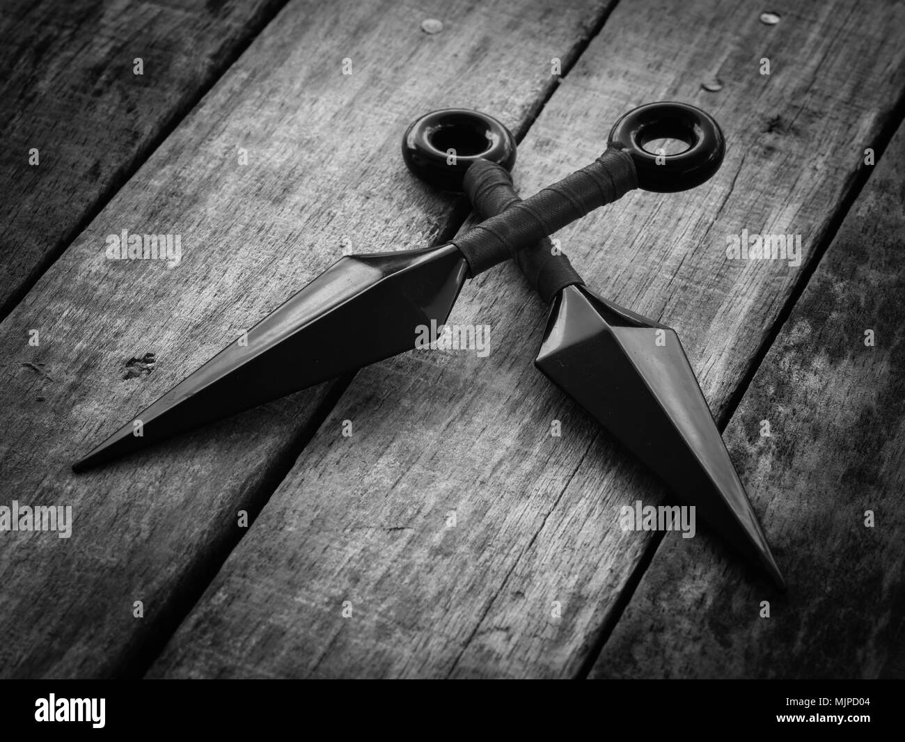 Throwing dagger Black and White Stock Photos & Images - Alamy