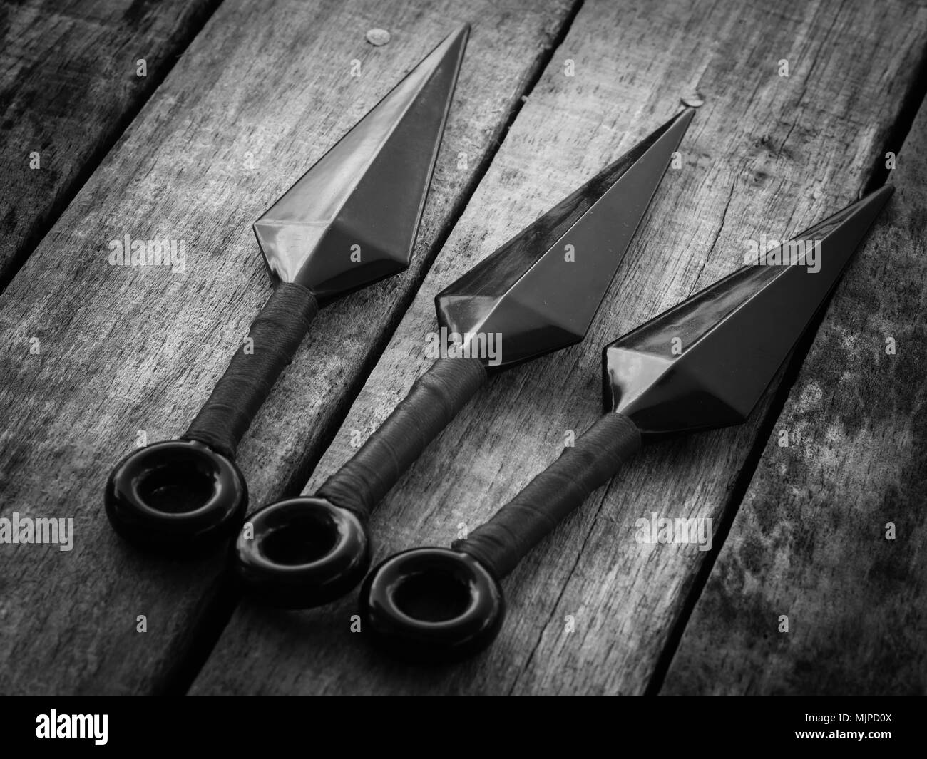 black and white throw ninja weapons Stock Photo - Alamy