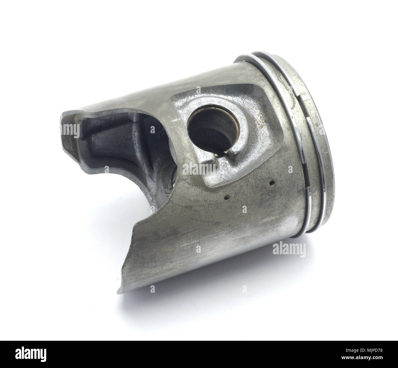 Old engine piston isolated on white background Stock Photo - Alamy