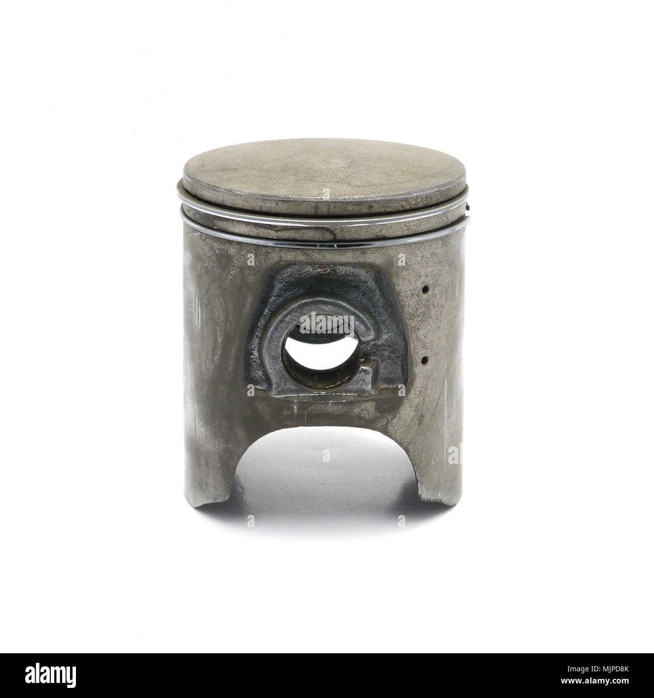 Old engine piston isolated on white background Stock Photo - Alamy