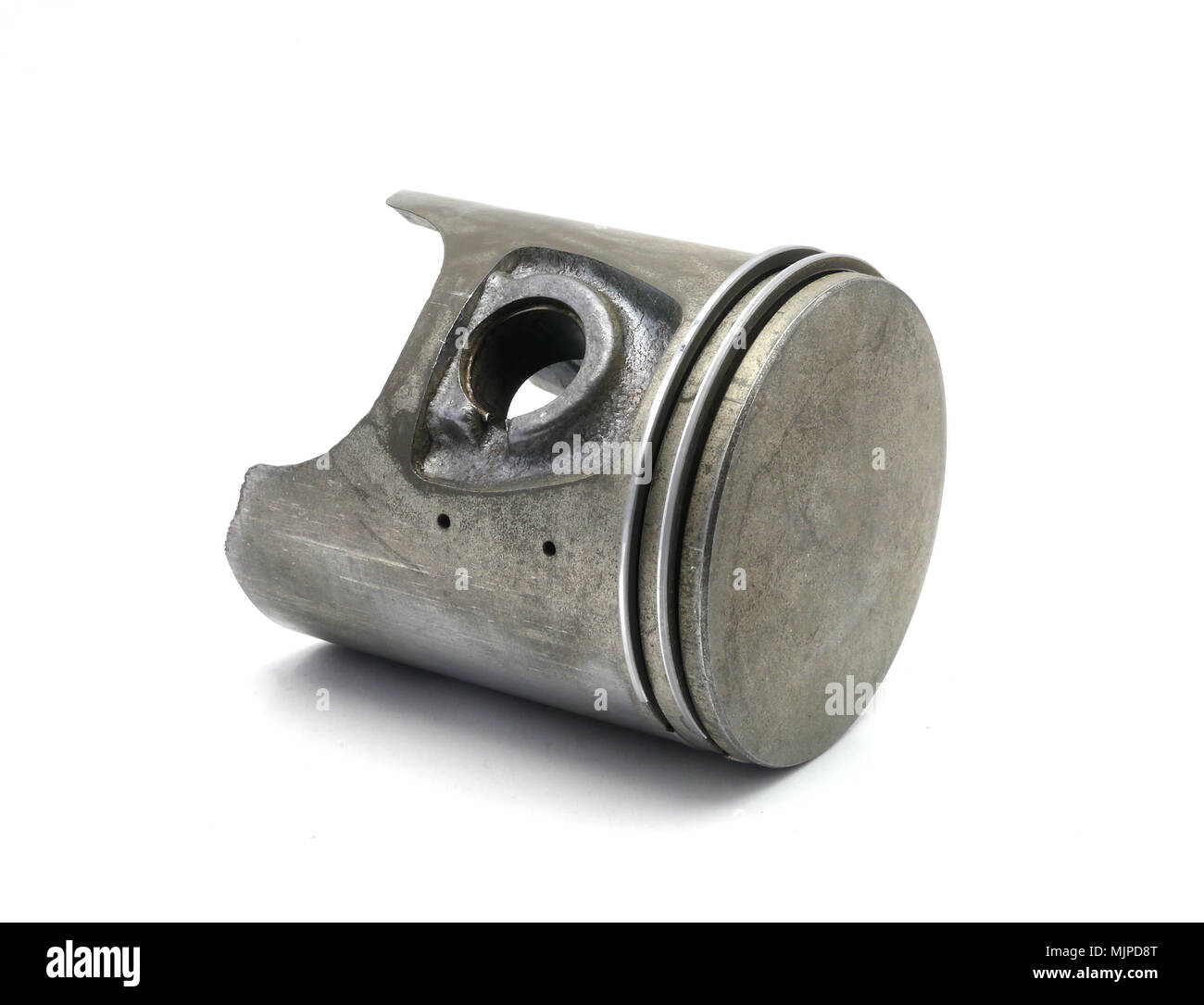 Old engine piston isolated on white background Stock Photo - Alamy