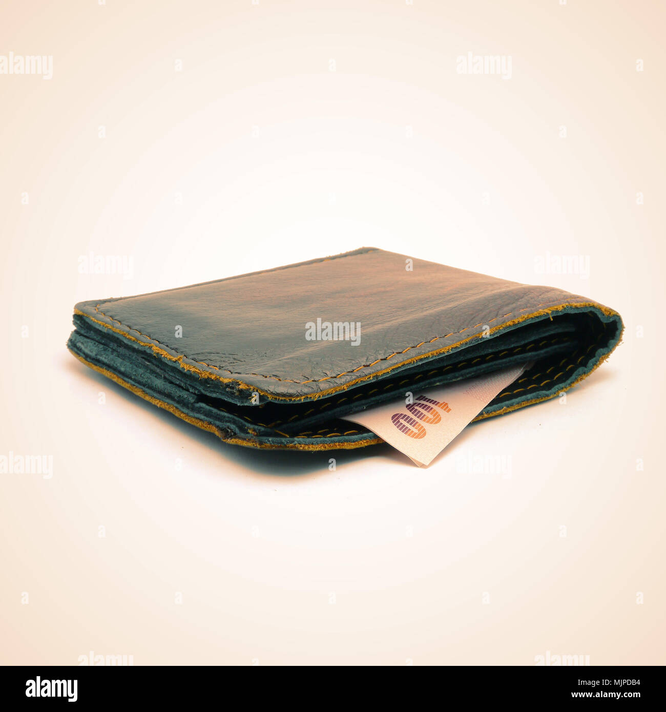 Old vintage used leather wallet hi-res stock photography and images - Alamy