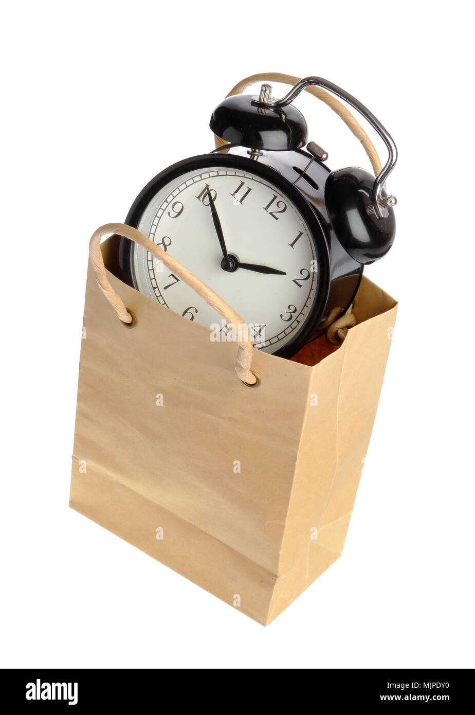 One black alarm clock inside a brown paper bagwith handles isolated on ...