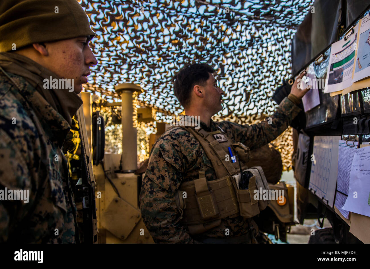 U.S. Marines Cpl. Kalib Hodge, an administrative specialist, and Cpl ...