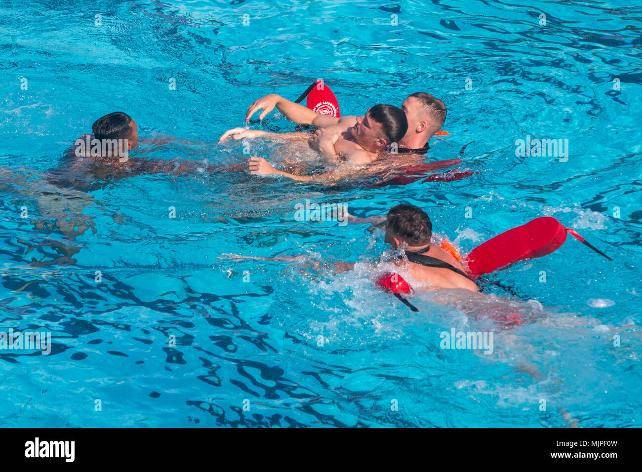 U.S. Marines attending a Marine Corps Instructor of Water Survival ...
