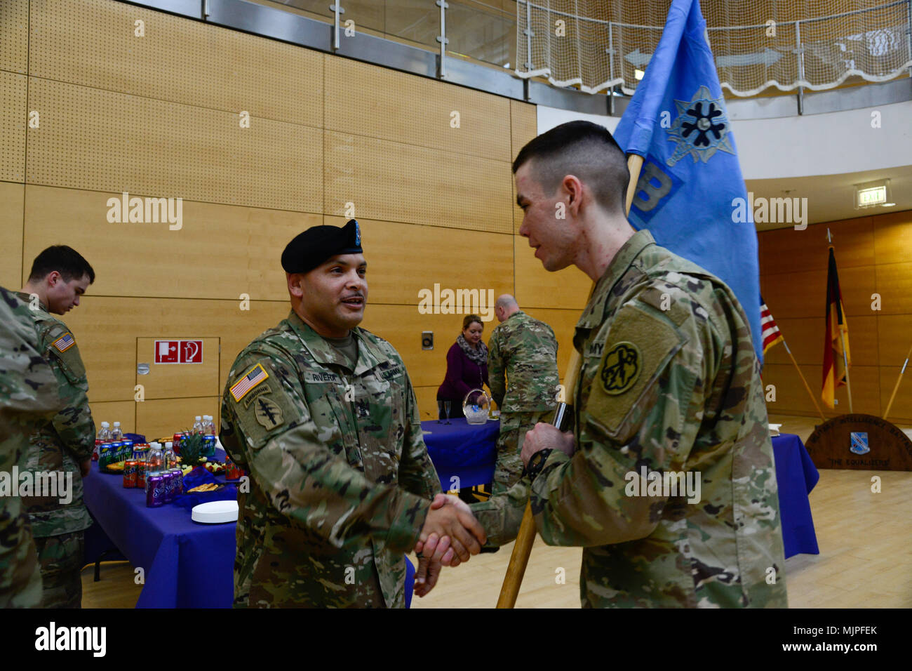 U.S. Army Command Sgt. Maj. Humberto Rivera, left, the incoming Command ...