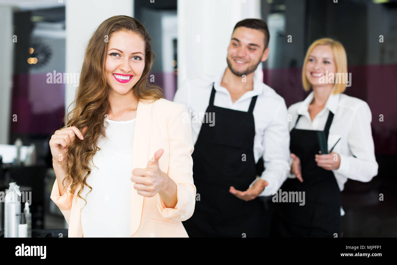 Beautiful girl happy haircut at the beauty salon Stock Photo - Alamy