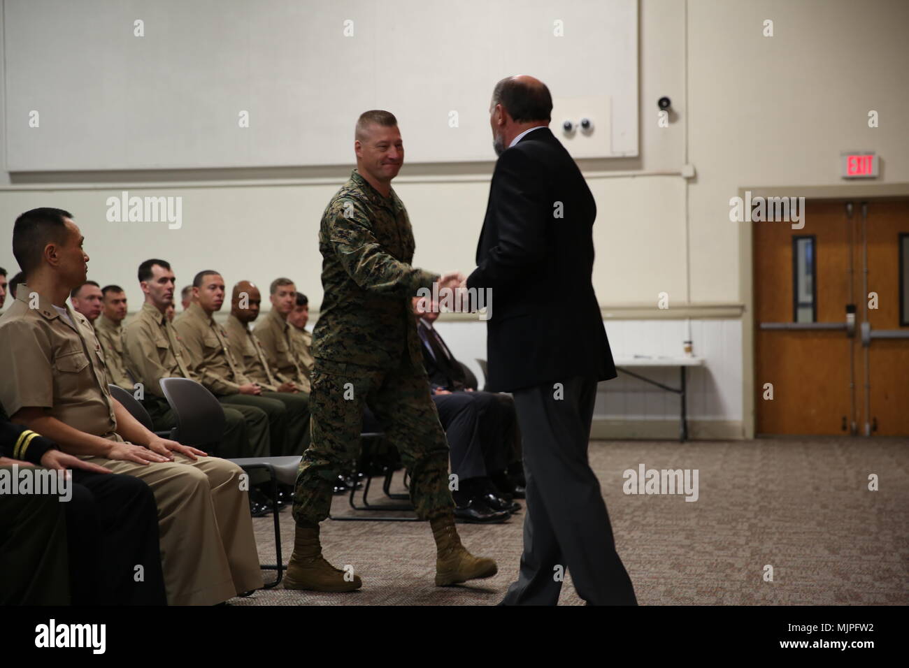 Brig. Gen. Julian D. Alford switches places with Cesare Cardi to speak ...