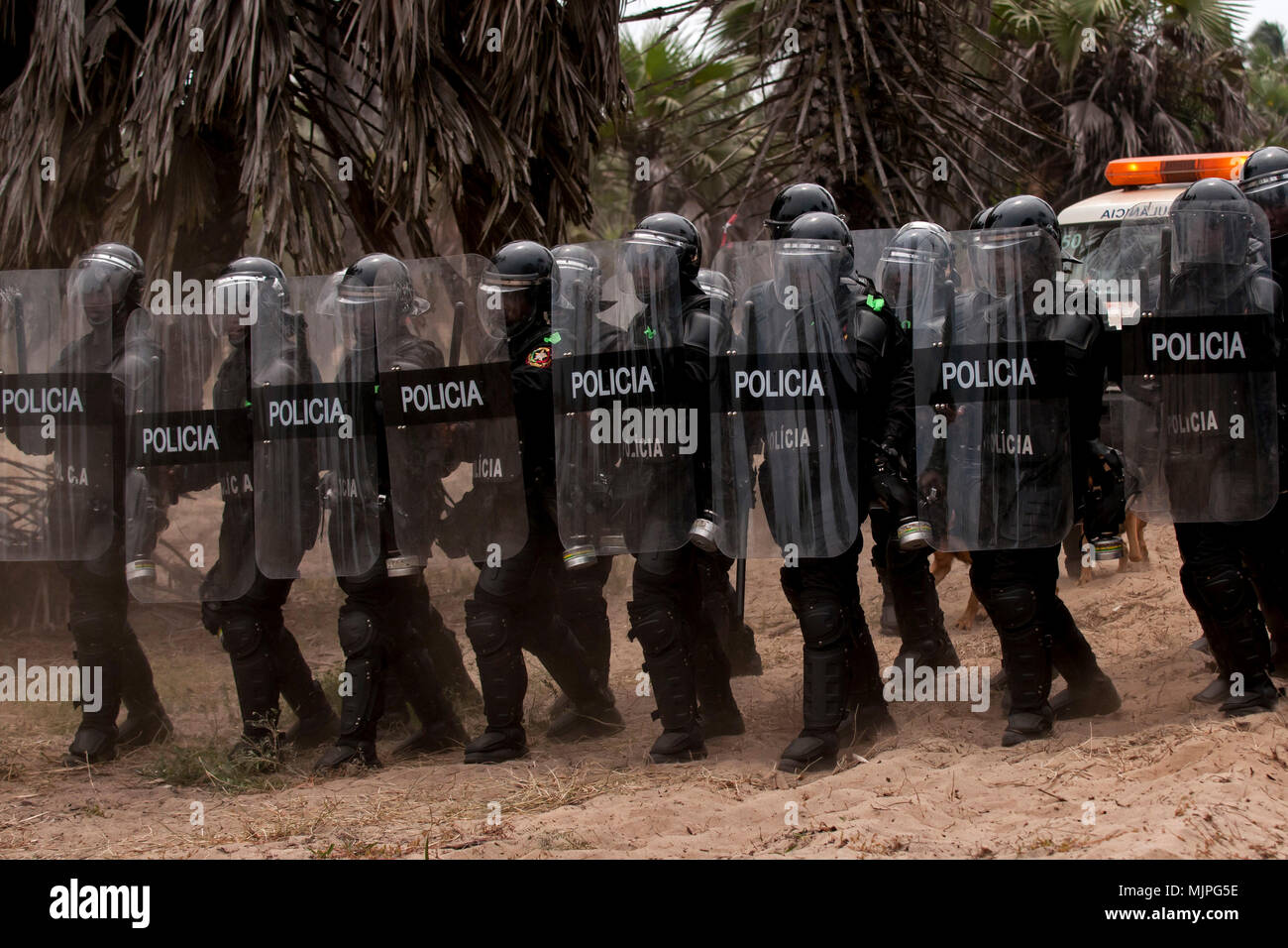 Members of the Angolan police forces demonstrate a response to a riot ...
