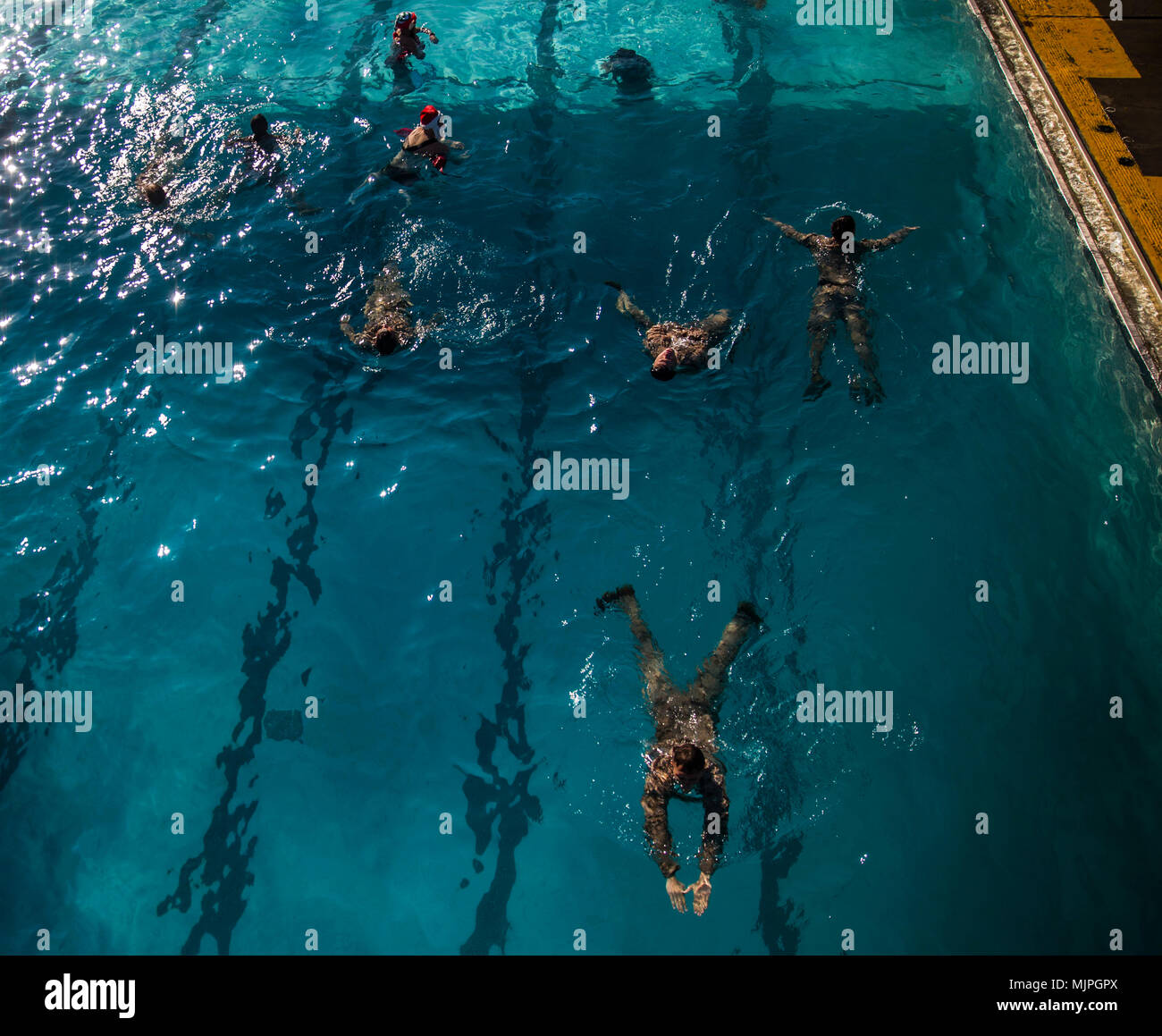 U.S. Marines with 7th Engineer Support Battalion conduct the 250 meter ...