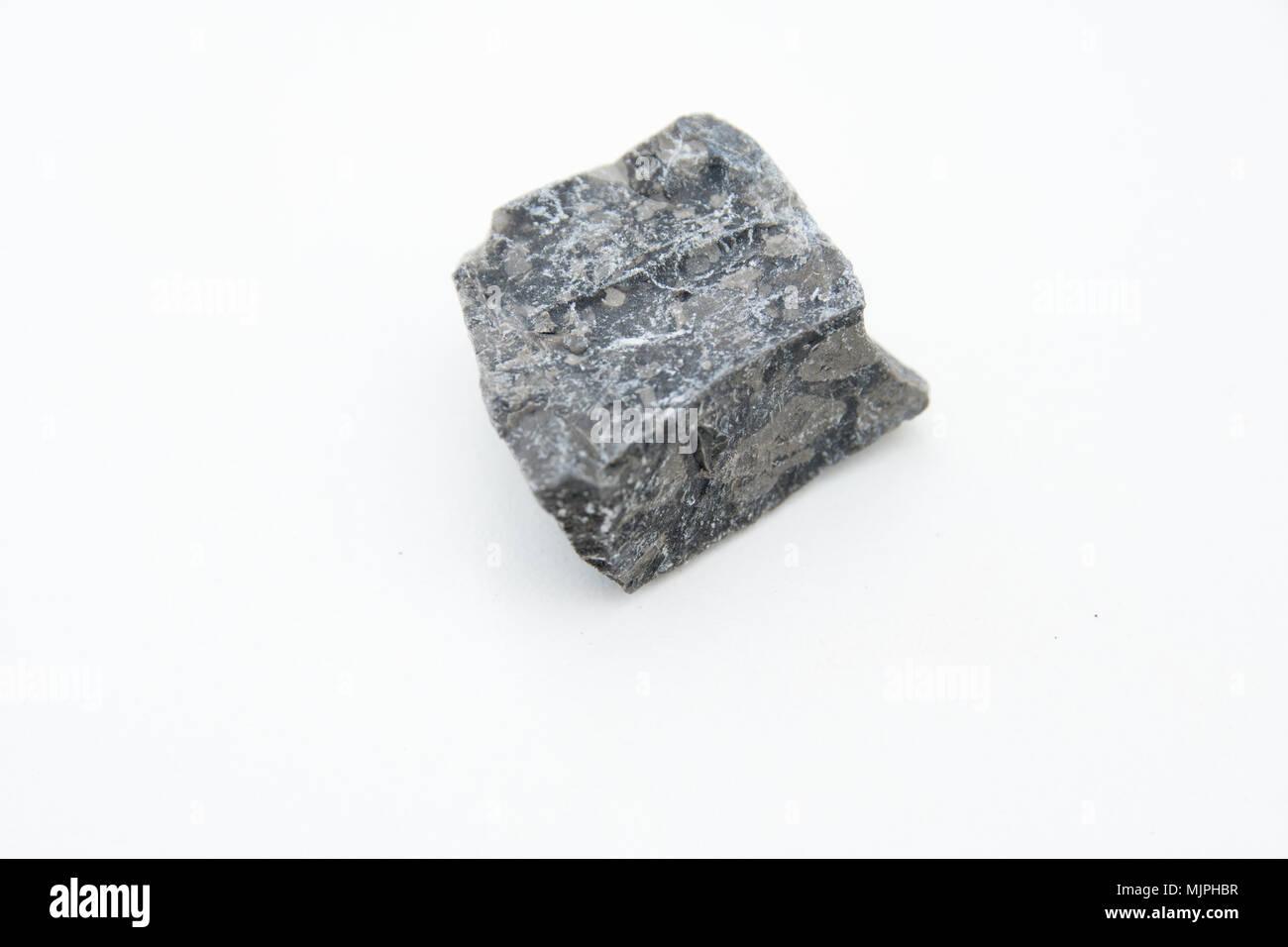 extreme close up with a lot of details of bauxite mineral isolated over ...