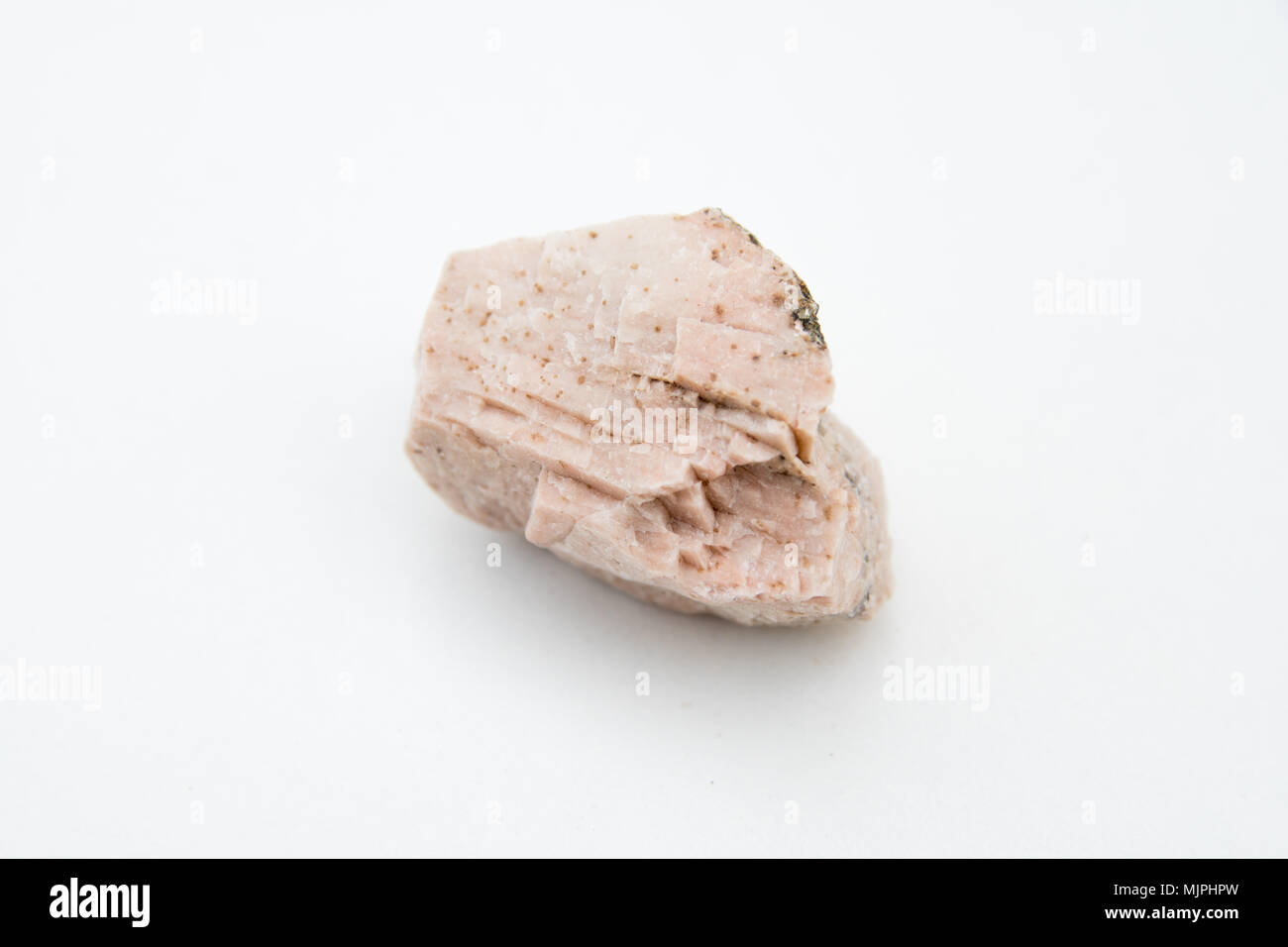 extreme close up with a lot of details of feldspar mineral isolated ...