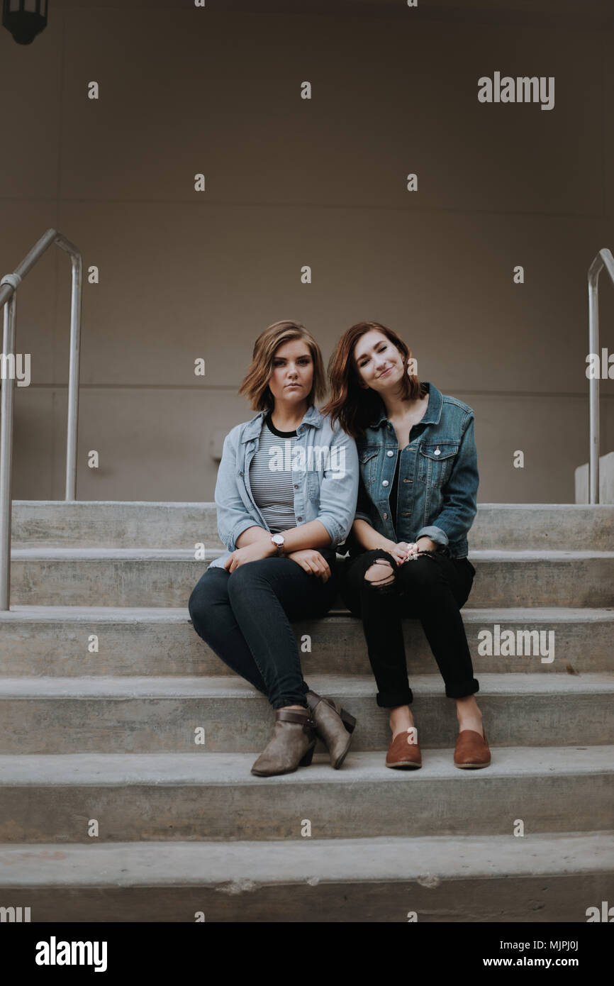 Cute Young Female Musicians Girl Friends Laughing and Singing on Urban ...