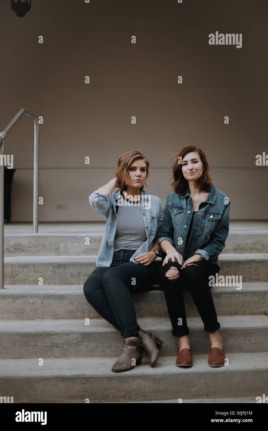 Cute Young Female Musicians Girl Friends Laughing and Singing on Urban ...