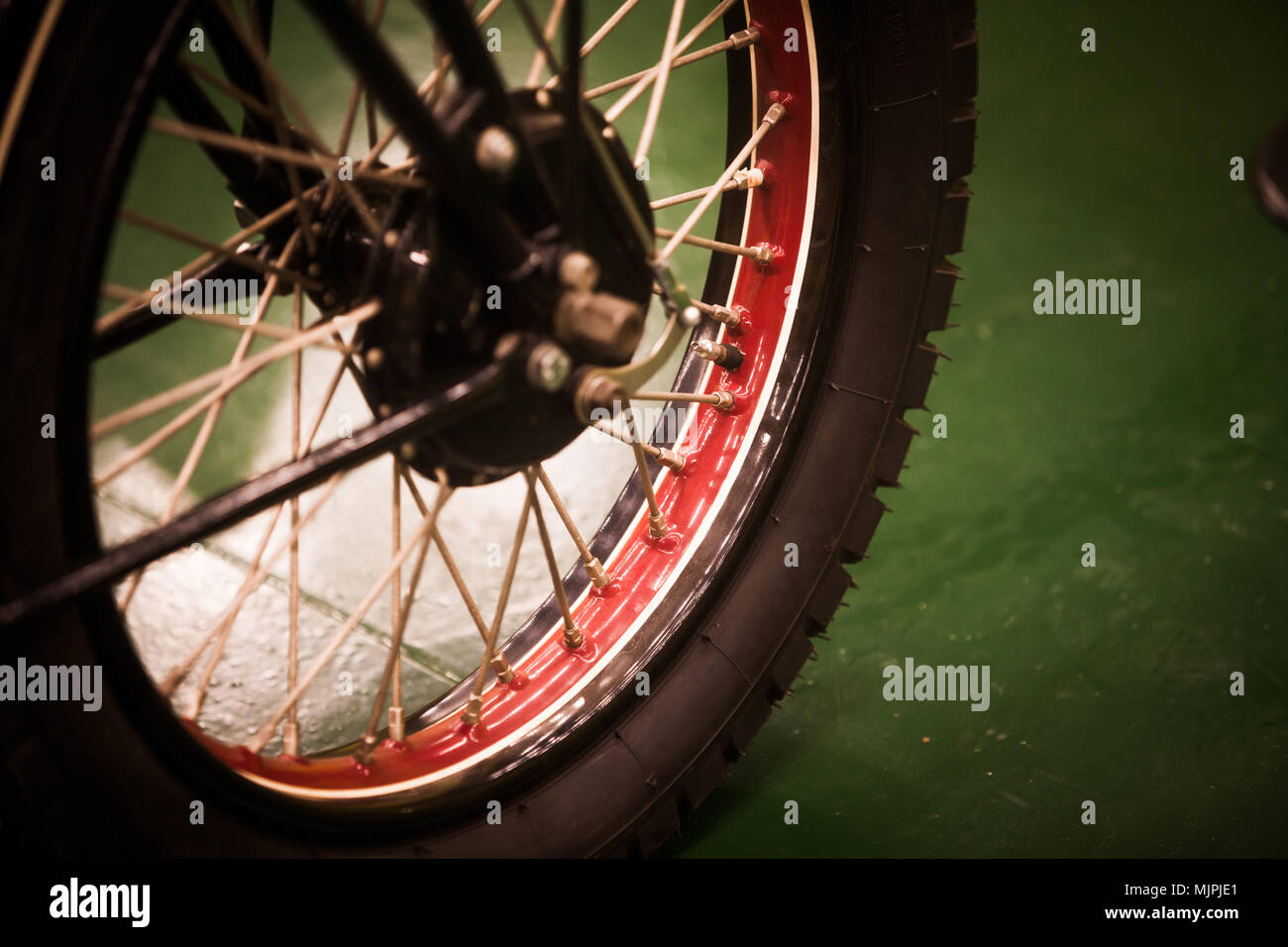 Color image of a vintage motorcycle wheel Stock Photo - Alamy