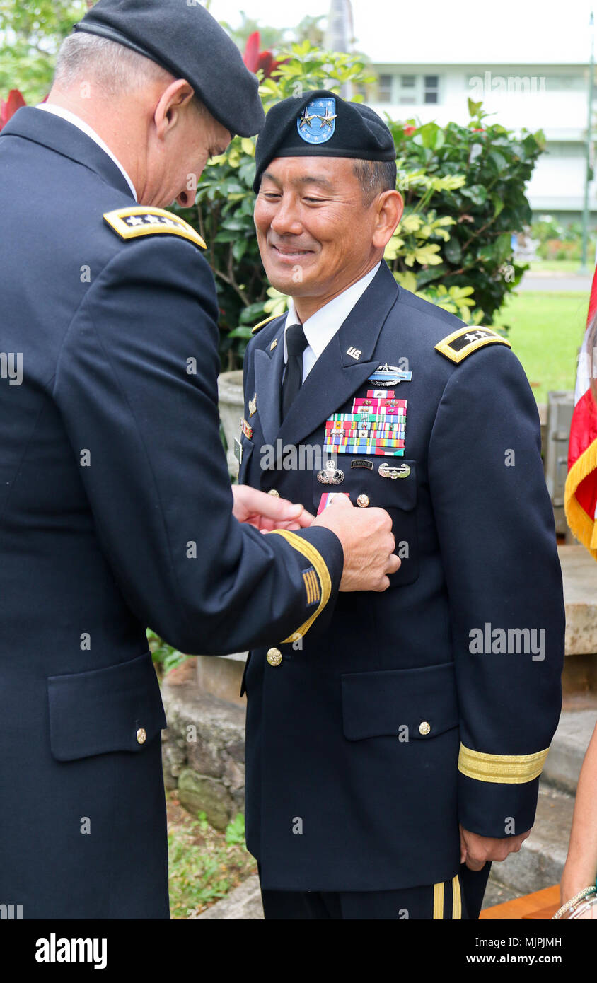Commanding General of U.S. Army Pacific, Gen. Robert Brown, pins the ...