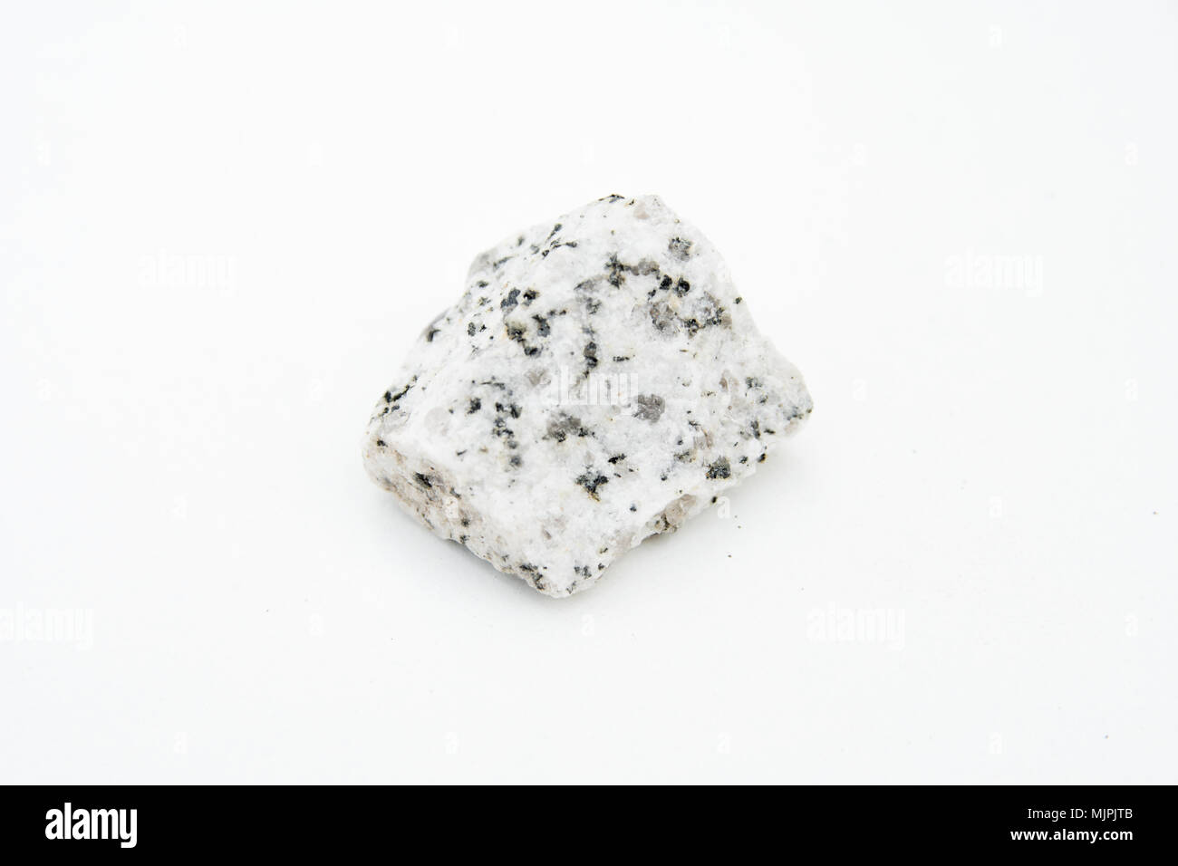 extreme close up with a lot of details of plagiogranite rock isolated ...