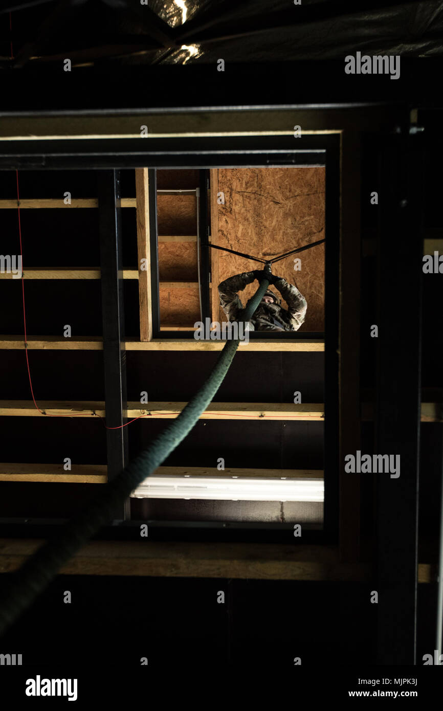 A U.S. Special Operation Forces operator prepares to fast rope near ...